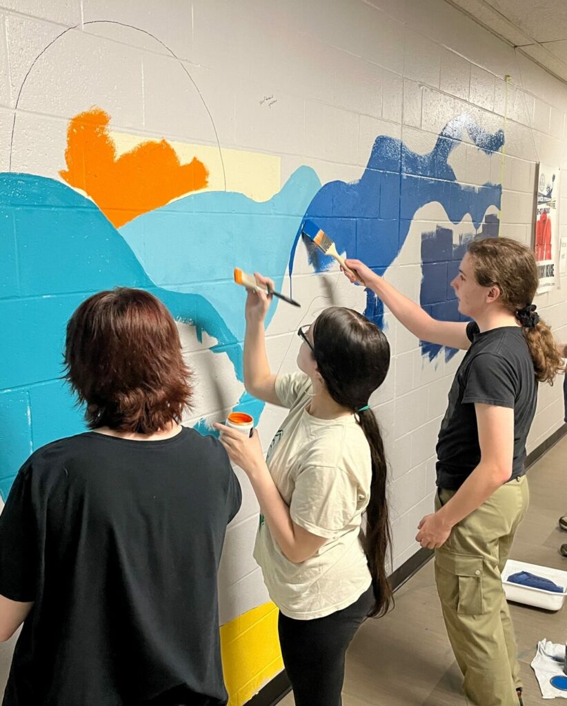 Volunteer Painters Complete Vibrant Scenic Mural in James W. Foley ...